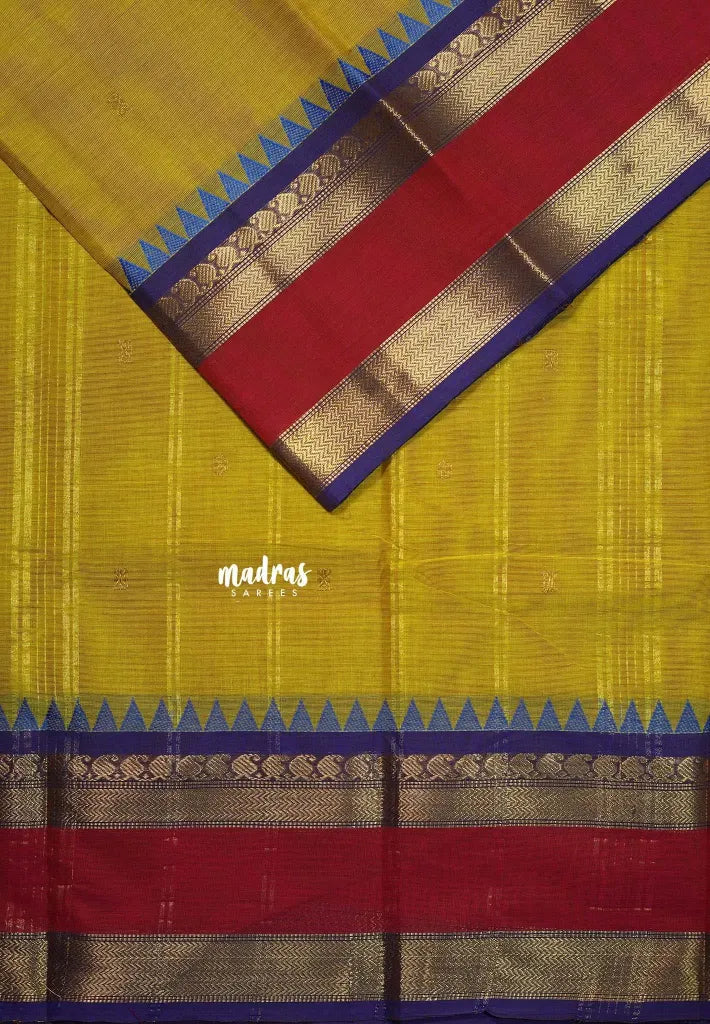 Yellow - Karthigai silk cotton in body with mango and temple skirt bor ...