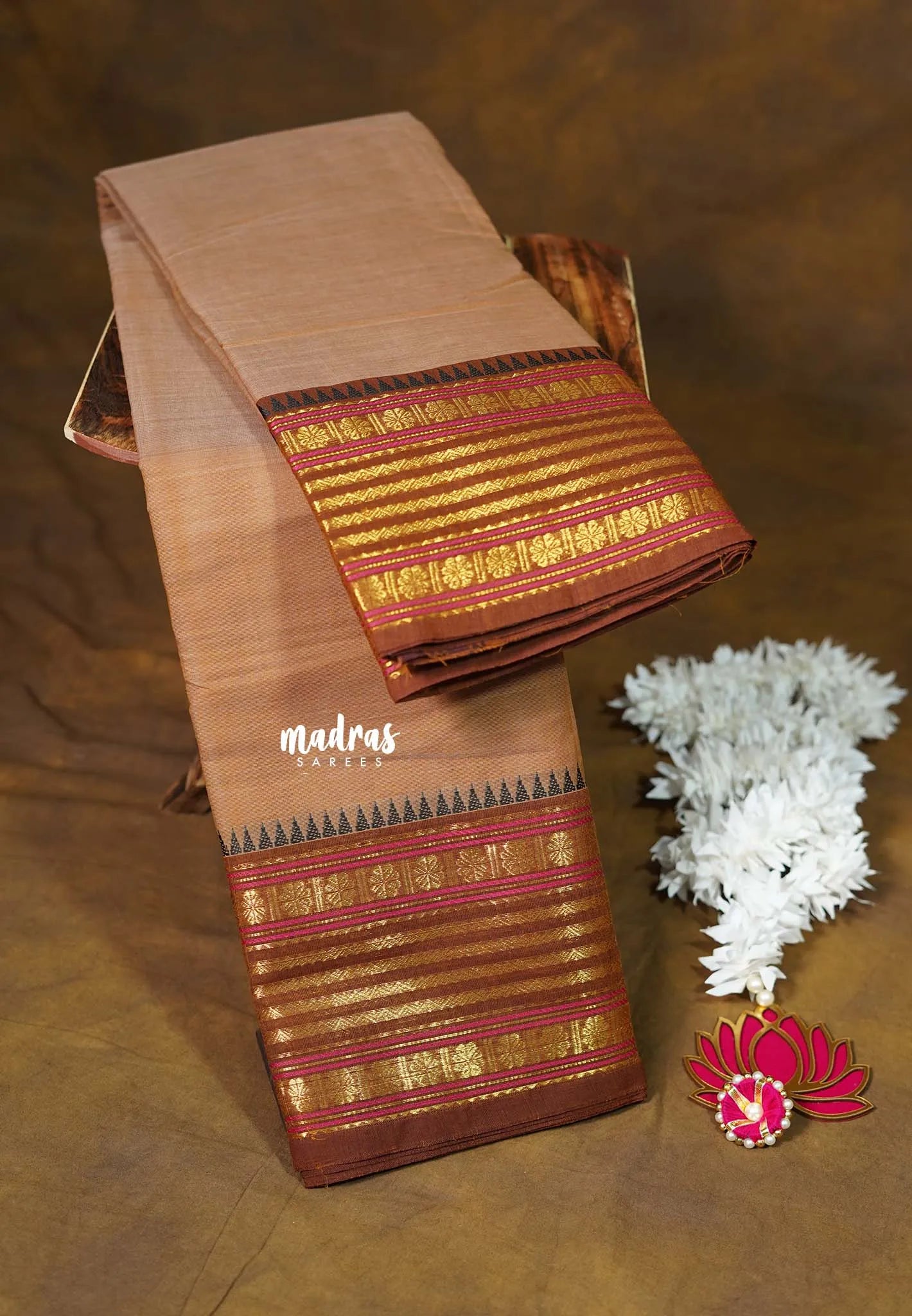 Pastel Brown - Karthigai silk cotton plain body multi line and flower ...